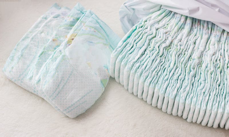 A Large Stack of Baby Diapers, Close-ups, Diaper Packaging Stock Image ...