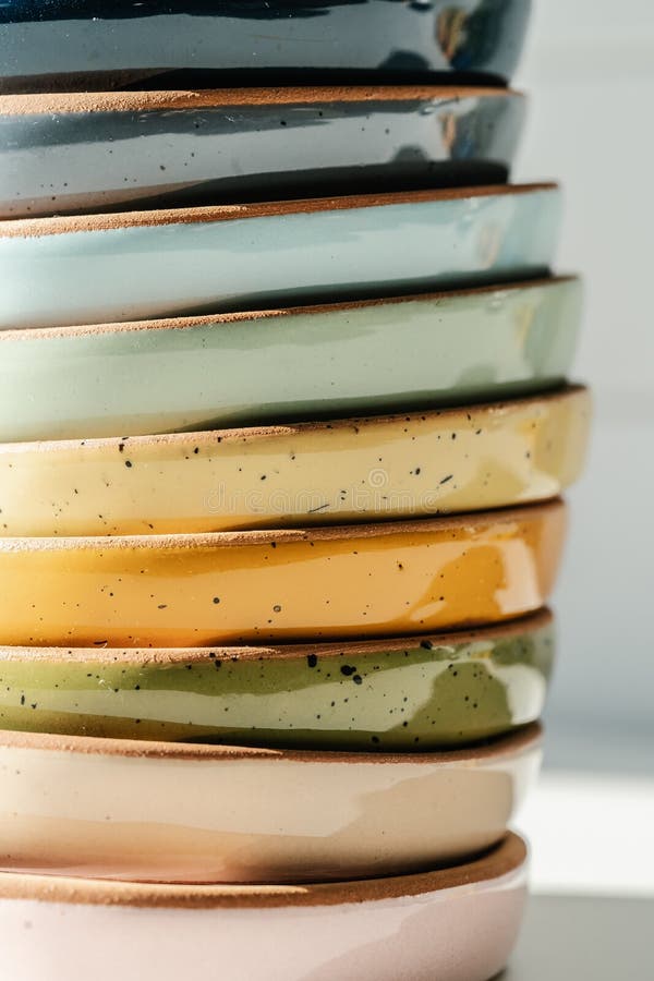 A Large Stack of Ceramic Cups in Pastel Colors. Stock Photo - Image of ...