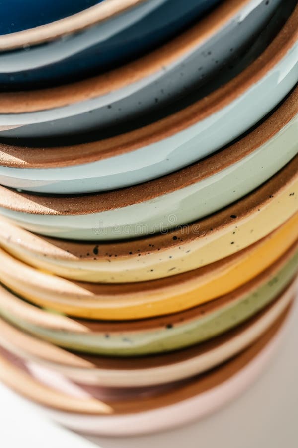 A Large Stack of Ceramic Cups in Pastel Colors. Stock Photo - Image of ...