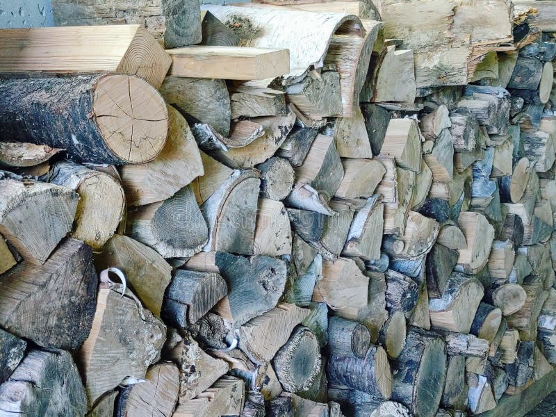 Large Stack of Firewood with Interesting Shapes and Textures Stock ...