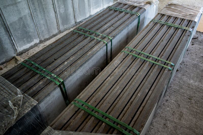 A Large Stack of Concrete Slabs on a Construction Site Stock Photo ...