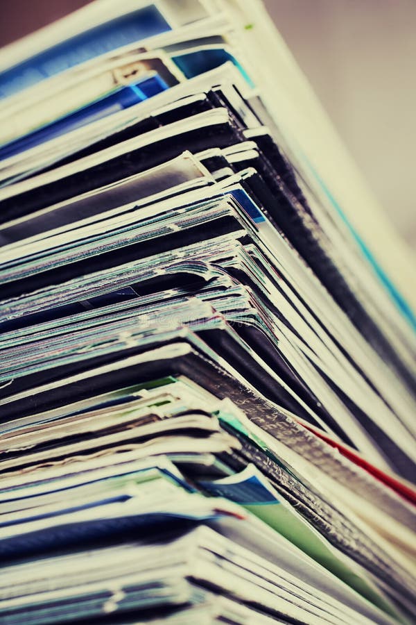 258 Messy Magazine Stack Stock Photos - Free & Royalty-Free Stock ...