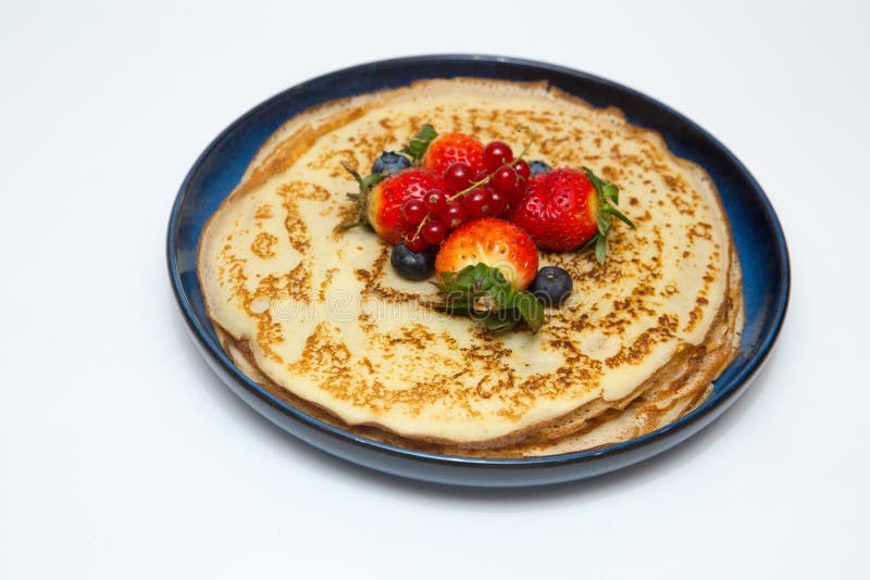 A Large Stack of Pancakes with Red Sweet Berries Stock Photo - Image of ...