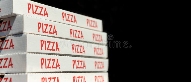 Large Stack of Pizza Boxes. Isolated Over Black Stock Photo - Image of ...