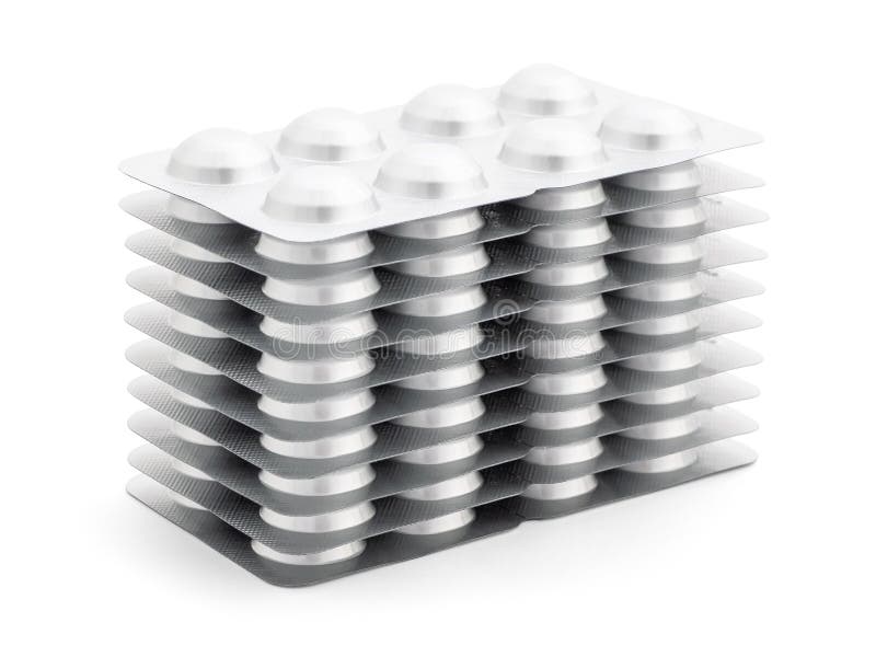 A Large Stack of Tablets in a Silver Package on a White Background ...