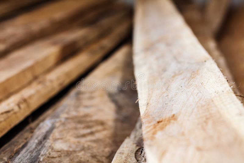 Large stack of wood planks stock photo. Image of lumberyard - 99419112