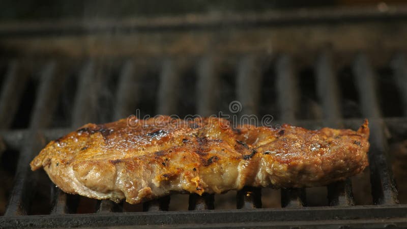 Large Steak Fried on the Grill, Side View, Close-up Shot Stock Photo ...