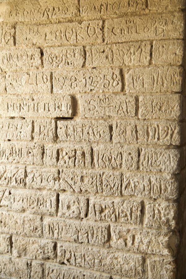 Large Stone Plaque Featuring Ancient Inscriptions Displayed on a Wall ...