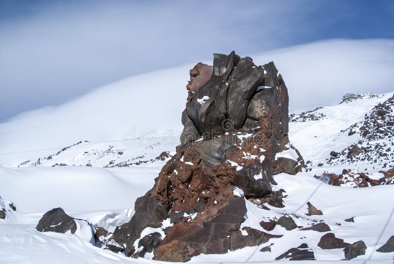 A Large Stone among the Snow-covered Hills Stock Photo - Image of ...