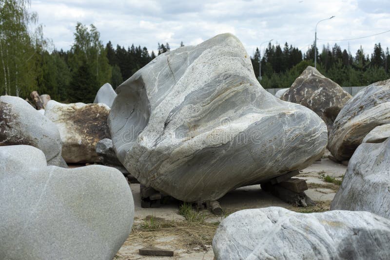 A Large Stone is Installed in the Park. Preparation of the Rock for ...