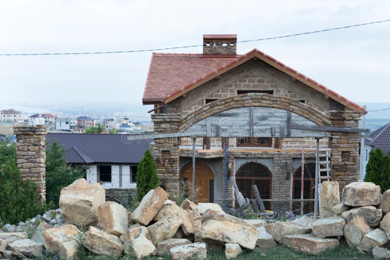 Large Stones on the Background of a House Under Construction. the Use ...