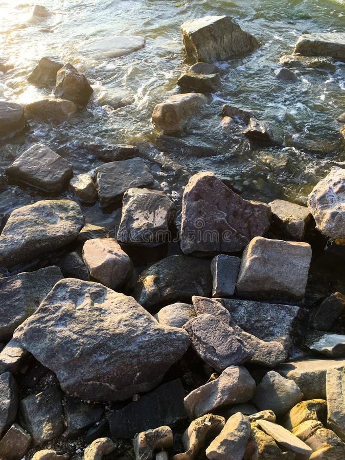 Rocky Shore And Lake Stones Stock Photo - Image of ripples, rocks: 5715308