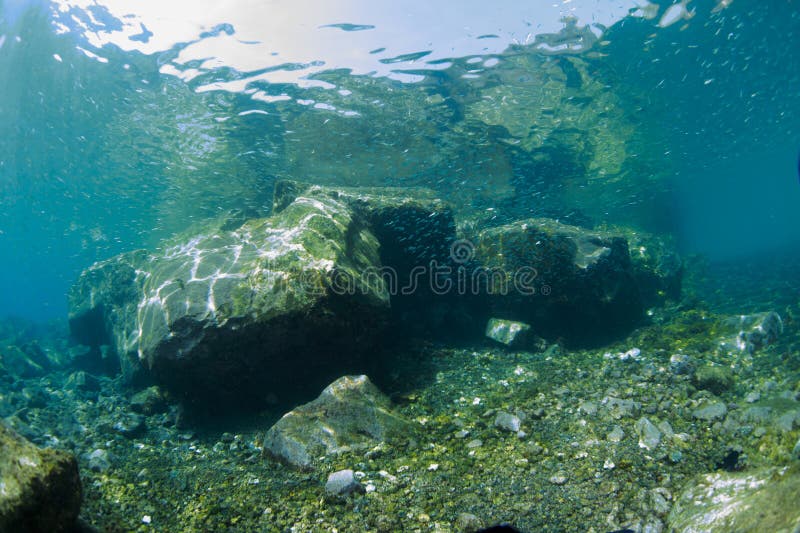 Large Stones Near the Shore Under Seawater Stock Image - Image of ...