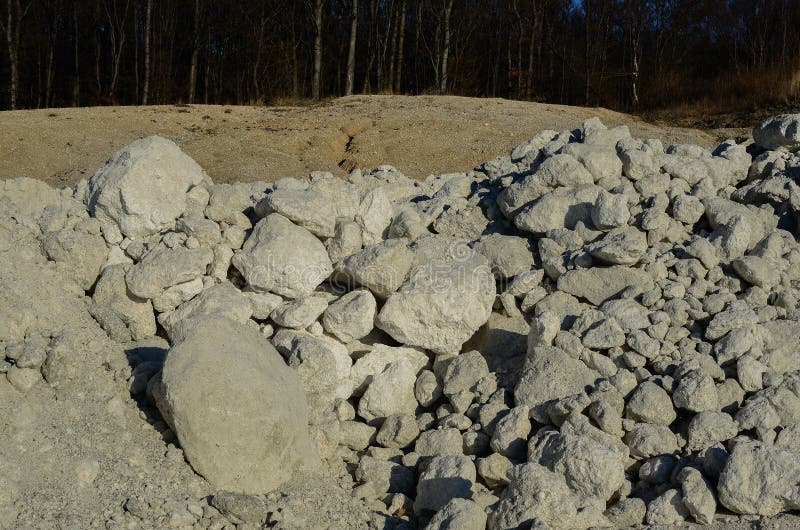 Large Stones of White Limestone Stock Photo - Image of filth, blue ...
