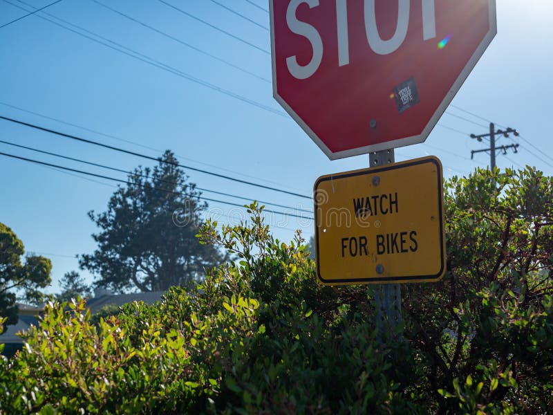 Large Stop Sign with Notice for Watch for Bikes on Sign Stock Photo ...