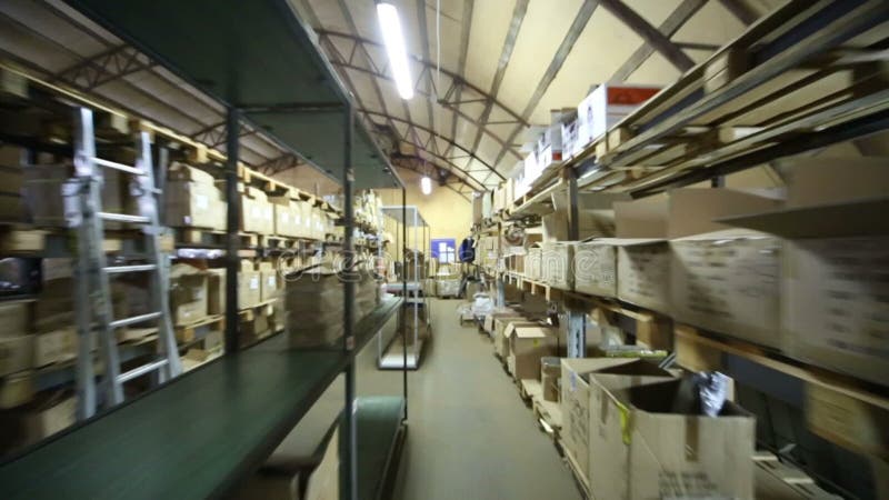 Large Storage Area with Cardboard Boxes Stacked in Stock Footage ...