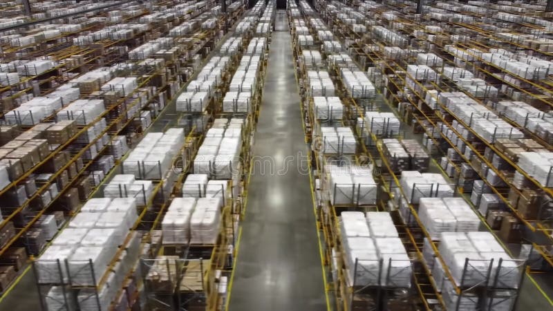Large Storage Warehouse Filled with Pallets Stacked High in Organized ...