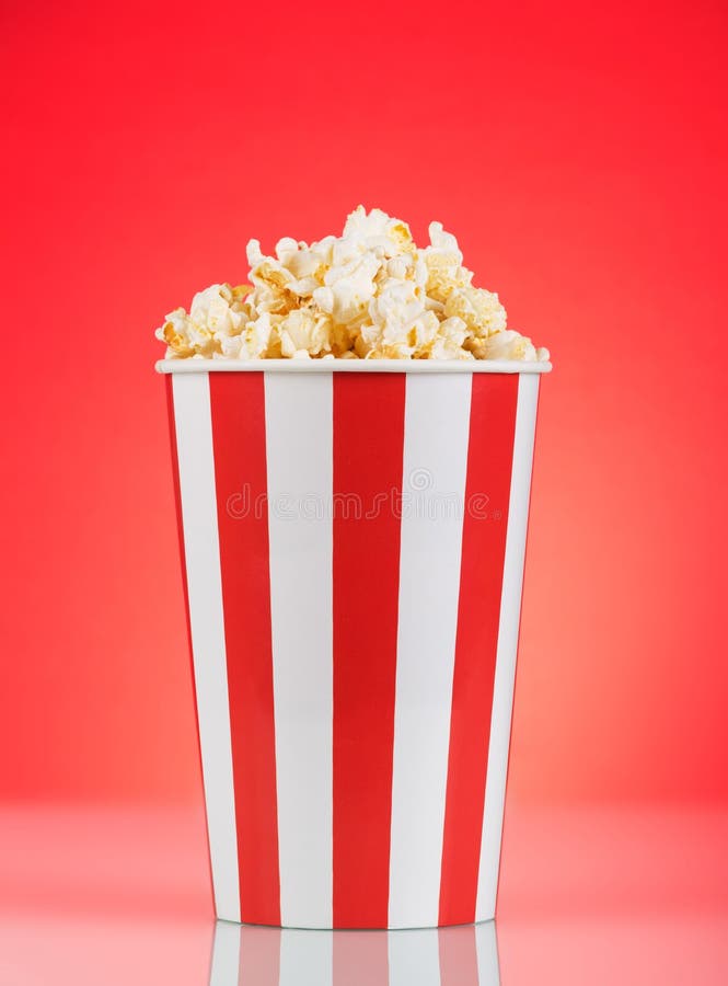 Large Striped Popcorn Box on a Bright Red Stock Photo - Image of ...
