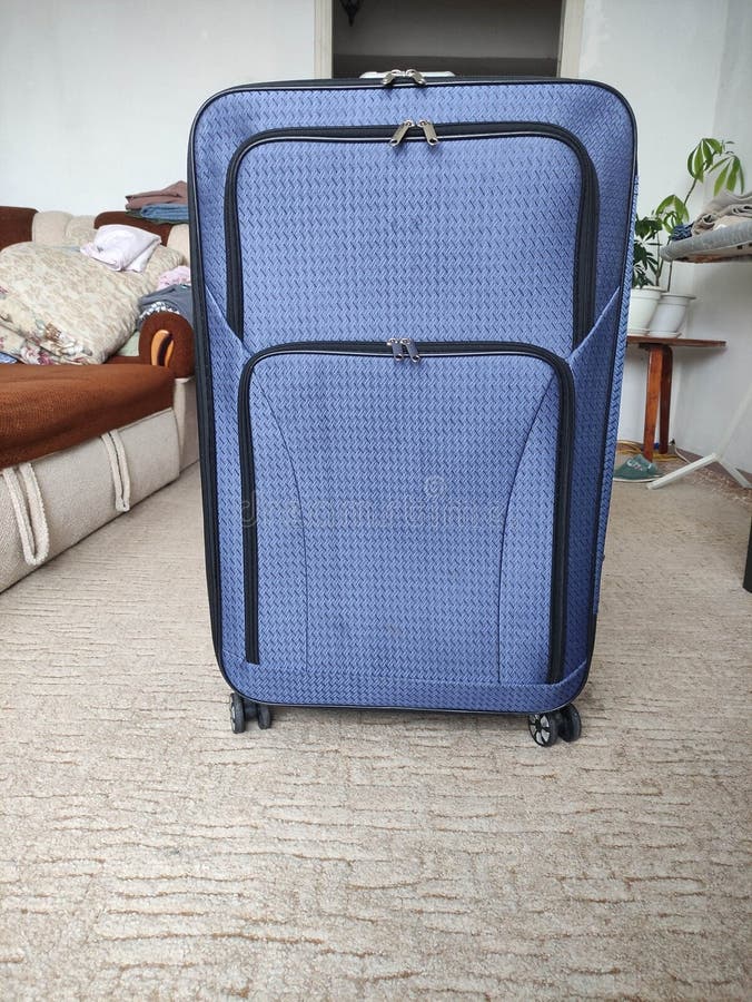 Large Suitcase on Wheels in the Room Stock Photo - Image of suitcase ...