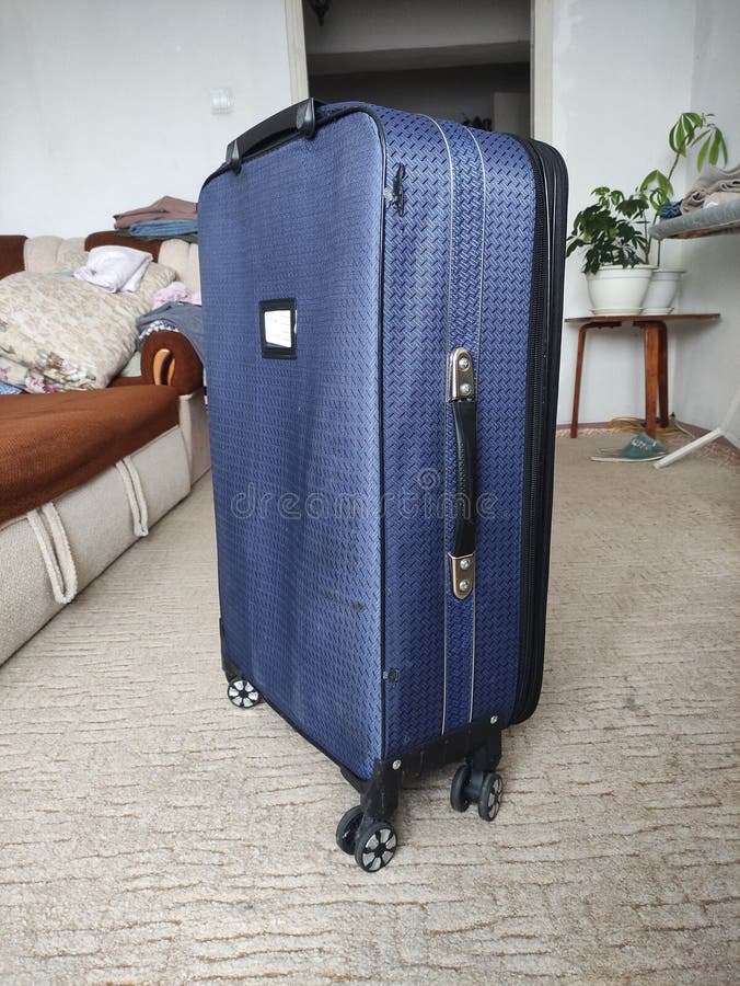 Large Suitcase on Wheels in the Room Stock Image - Image of vacation ...