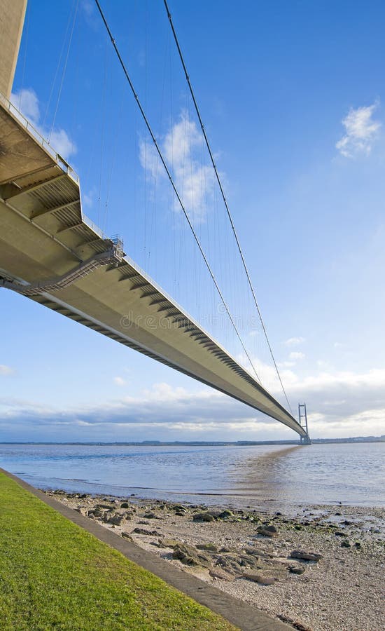 Large Suspension Bridge Over a River Stock Image - Image of beach ...