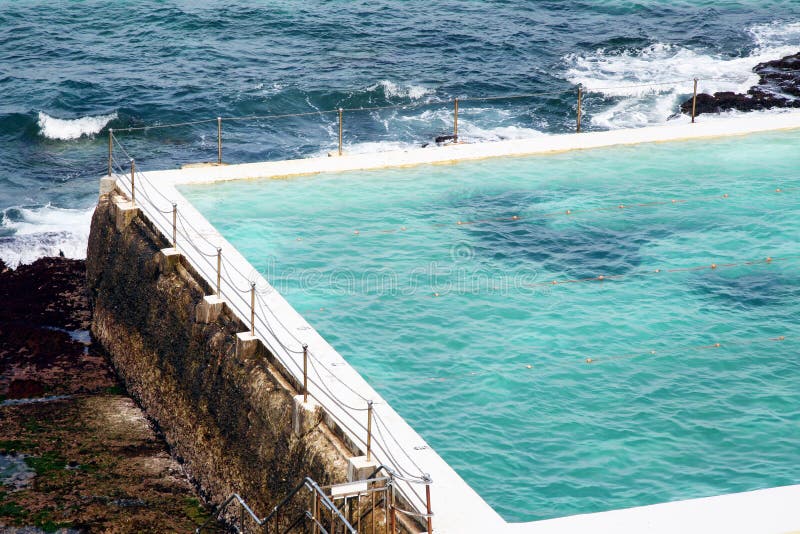 Large Swimming Pool by the Sea Stock Photo - Image of daytime, daylight ...