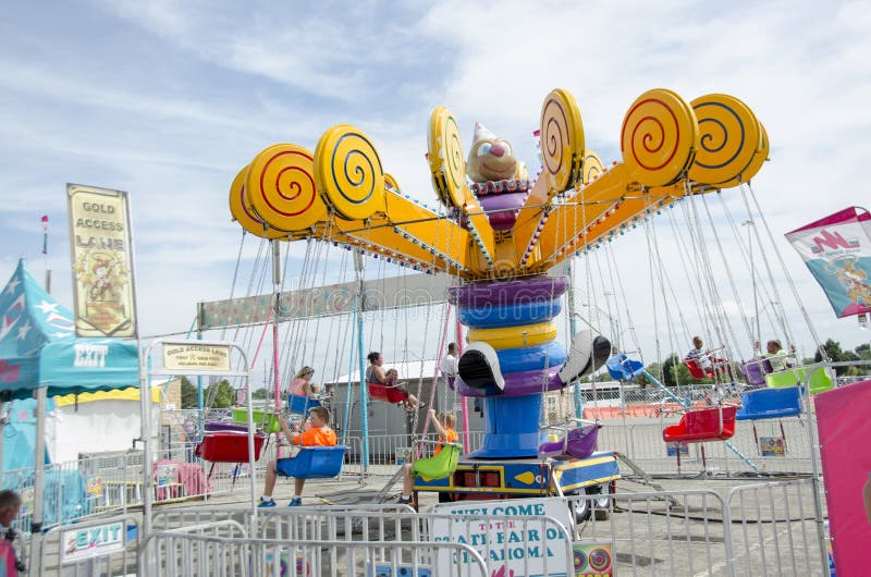 Large swing ride at fair editorial stock image. Image of state - 44672134