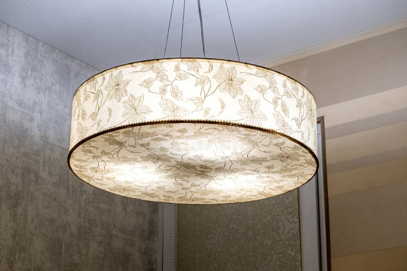 Large Swinging Round Chandelier Hanging from the Ceiling Stock Photo ...