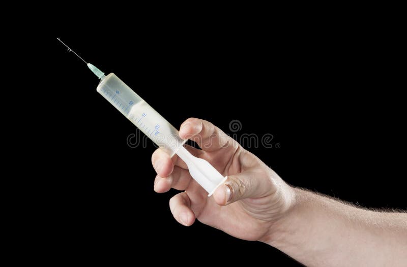 Large Syringe in hand stock photo. Image of vaccination - 29457464