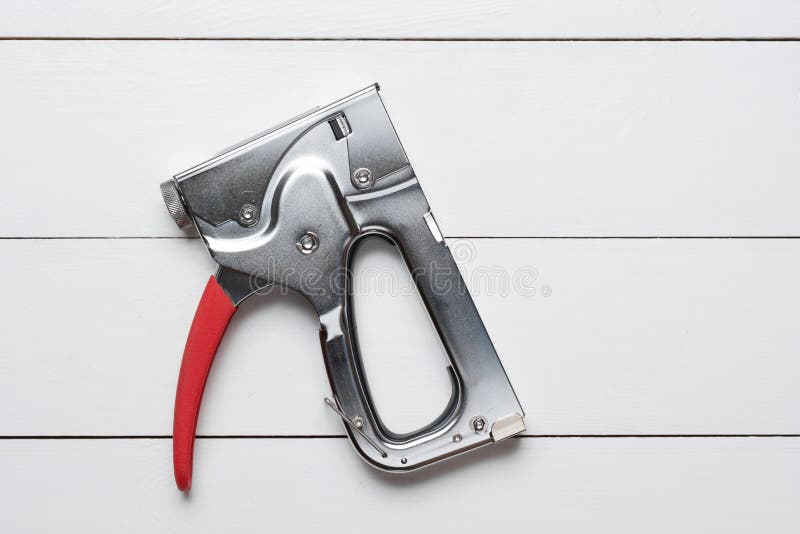 Large Tacker Stapler Gun on Wooden Floor Stock Photo - Image of wooden ...