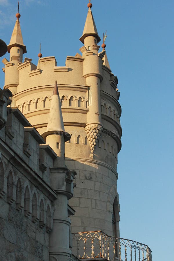 A Large Tall Tower with a Clock on the Side of a Building Stock Image ...