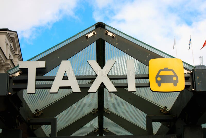 A Large Taxi Sign in the City Stock Photo - Image of customer, close ...