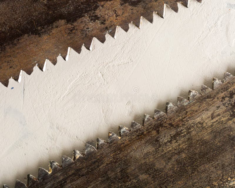Large Teeth of an Old Saw on Wood. Sharp and Uneven Edges. Rusted ...