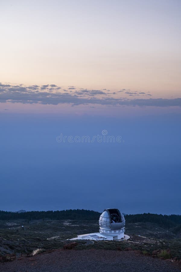 A Large Telescope is on a Hill Overlooking the Ocean. Stock Image ...