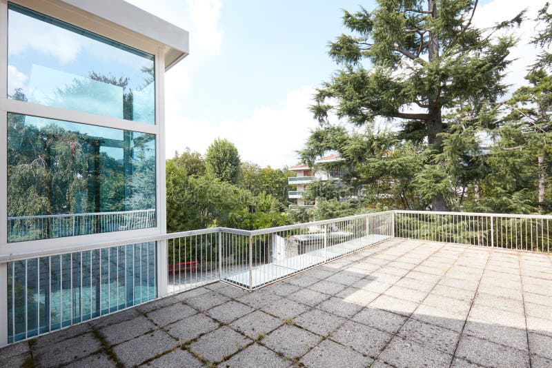 Large Terrace in Country House with Big Trees View and Glass Elevator ...