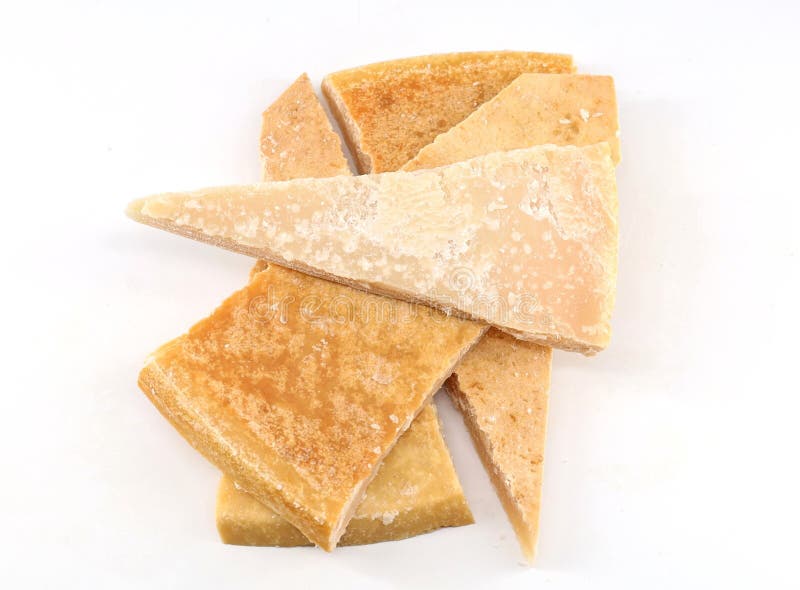 Large Thick Rinds of Aged Cheese on White Background. Stock Photo ...