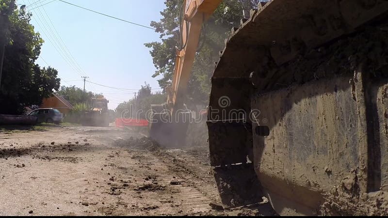 Excavator Digging Foundation Trench for Building Construction Project ... Excavator Digging Foundation Trench for Building Construction Project ...