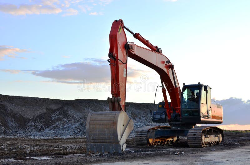 Large Tracked Excavator Works in a Gravel Pit. Stock Image - Image of ...
