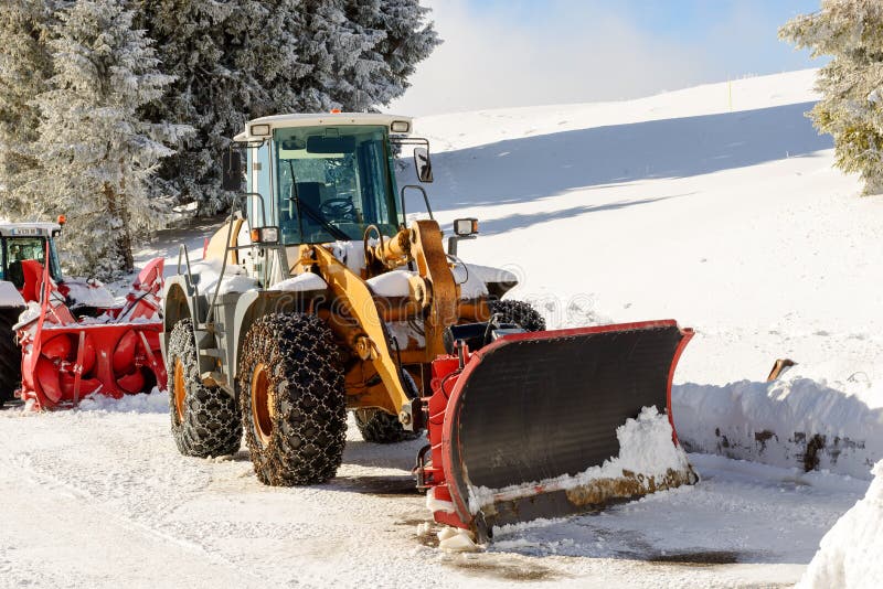 Large Tractor with Snow Plow during a Winter Stock Image - Image of ...