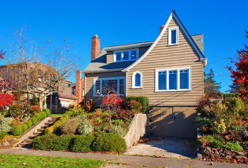 Large Traditional House with Shrubbery. Stock Photo - Image of building ...