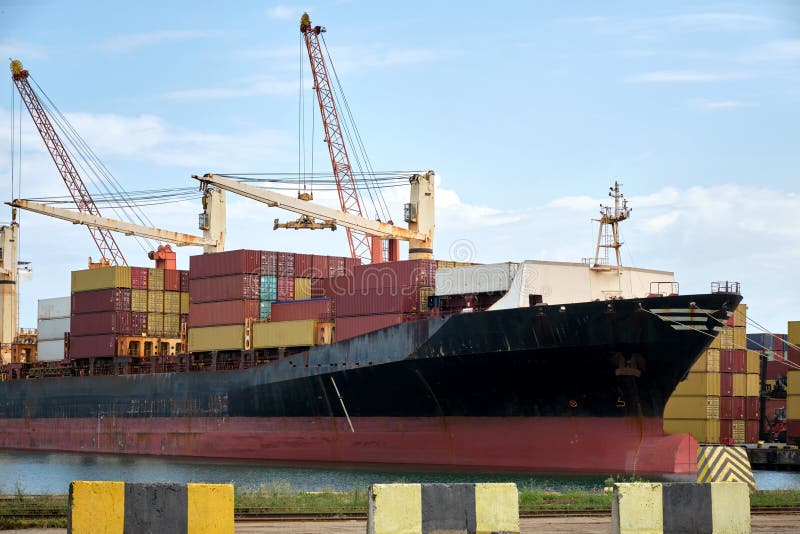 A Large Transport Ship is Unloading Containers at the Port Stock Image ...