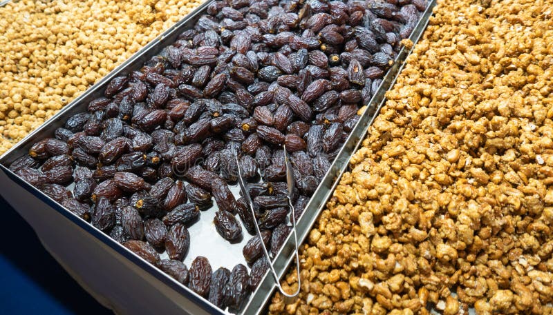 Large Trays of Dates and Nuts at the Market Stock Photo - Image of ...