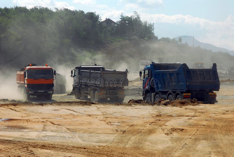 Large Trucks at Construction Site Stock Image - Image of building ...