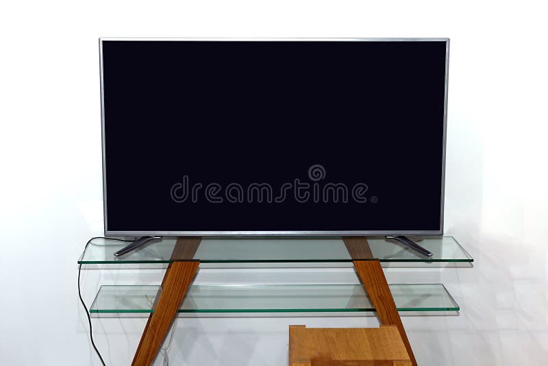 Large TV Screen on Glass Shelf Inside Modern Interior Stock Photo ...