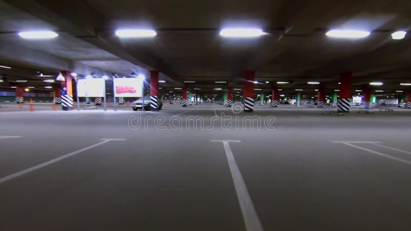 Large Underground Garage with Illumination. Aerial Stock Footage ...
