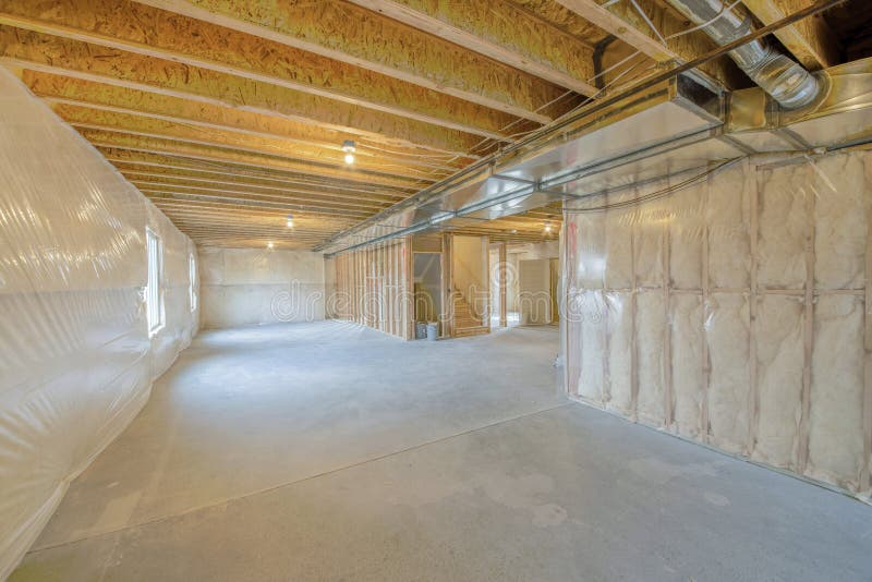 Large Unfinished Basement with Woodframes and Wall Insulation Stock ...