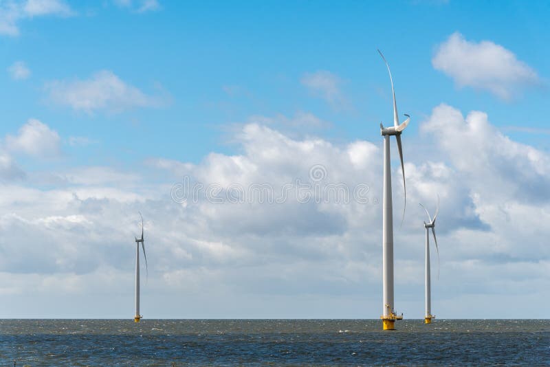 Windmills in the ocean stock image. Image of produce - 107263175