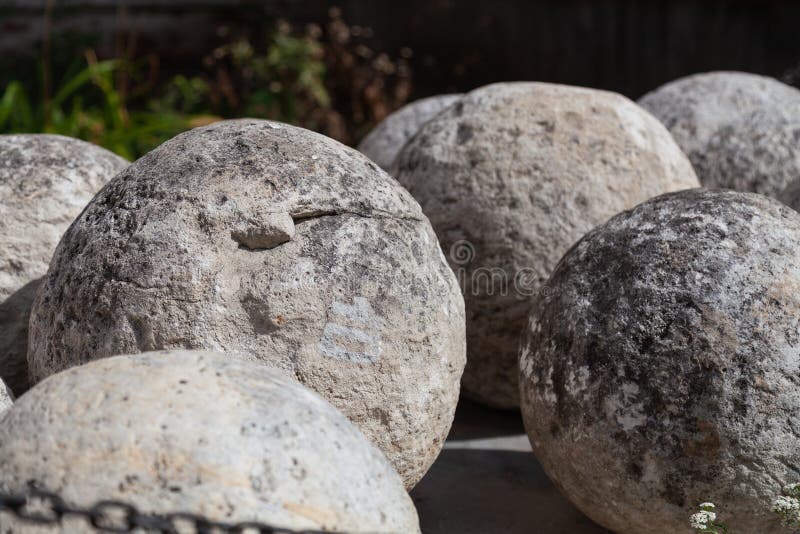 Large Vintage Stone Cannon Balls on a Blurred Background Stock Photo ...