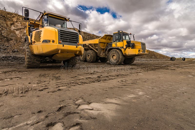 Large Volume Trucks To Work in Road Construction Stock Image - Image of ...