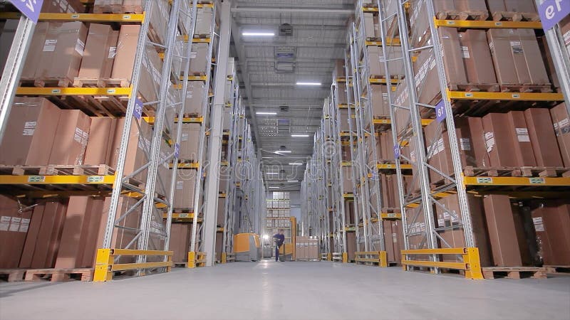 Large Machine in Warehouse, Modern Forklift in Warehouse, Workflow in ...